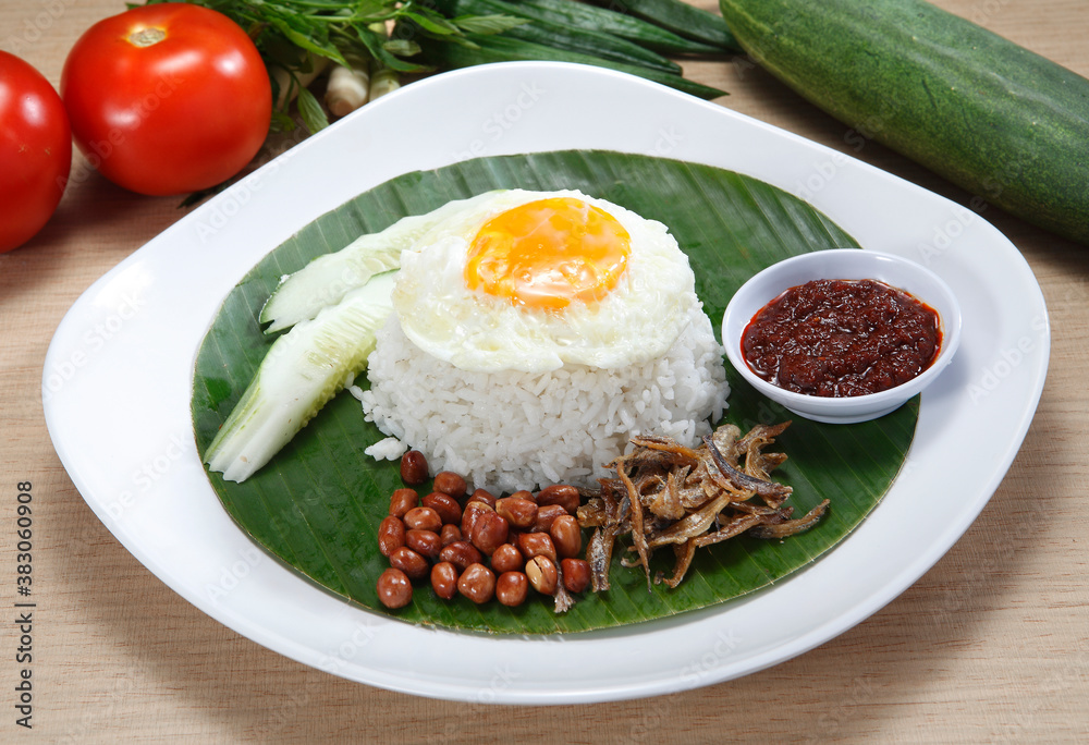 Nasi lemak is a Malay fragrant rice dish cooked in coconut milk and ...