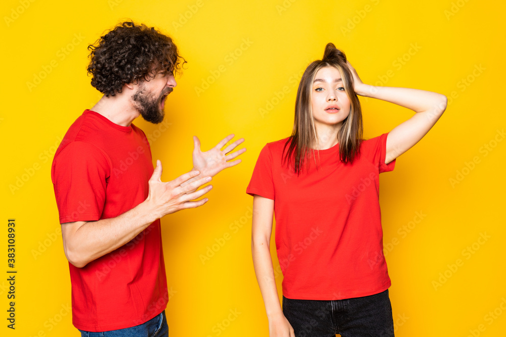 Portrait couple man and woman screaming at each other during fight over ...
