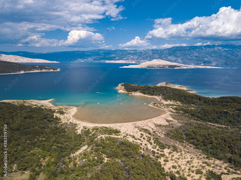 Aerial view of Sahara beach in Rab Island, forests around and mainland ...