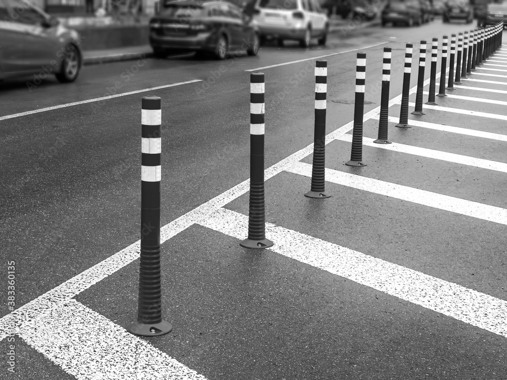 Road markings and bollards Stock Photo | Adobe Stock