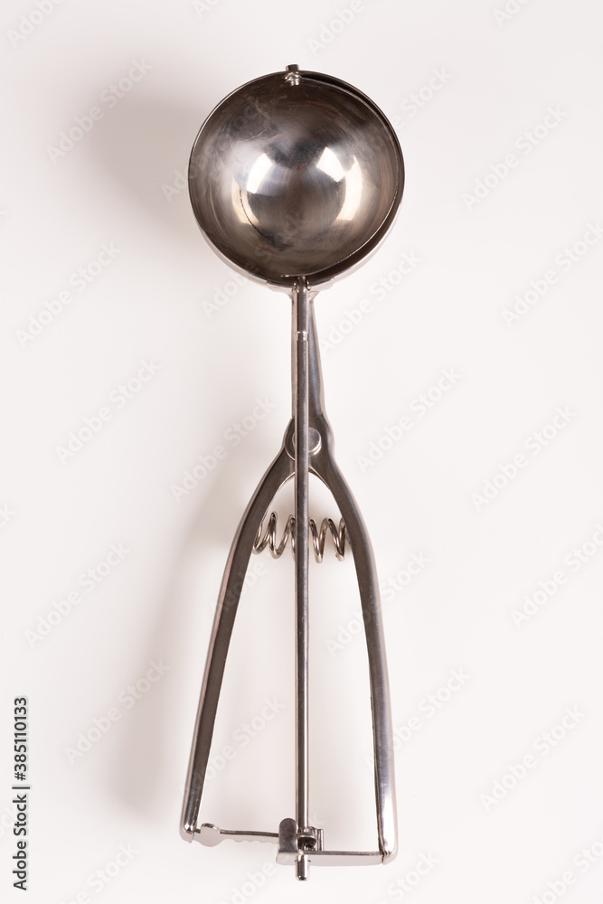 Photo Stock Mechanical ice cream scoop with a crank handle that moves a ...