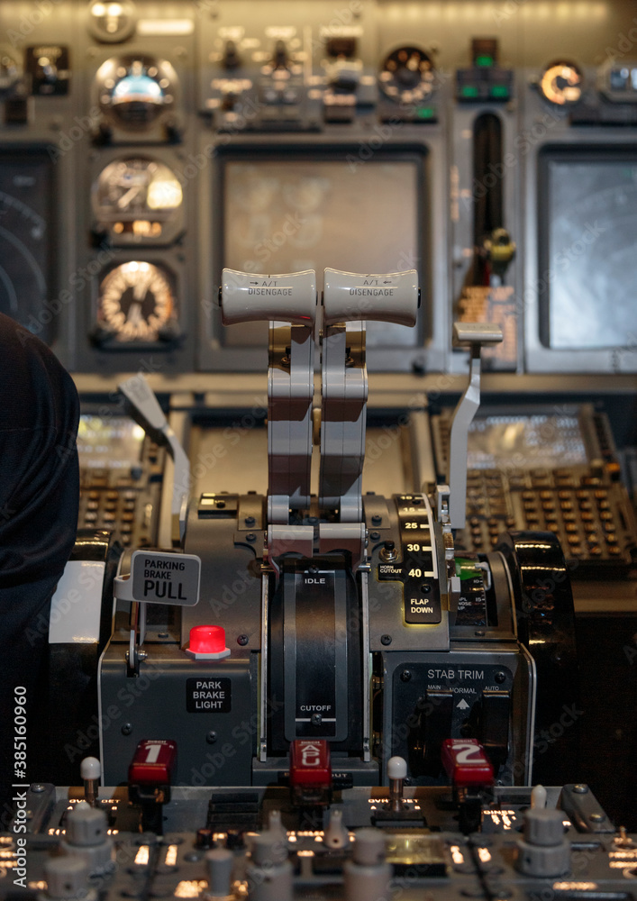 Airplane flight deck console with levers Stock Photo | Adobe Stock