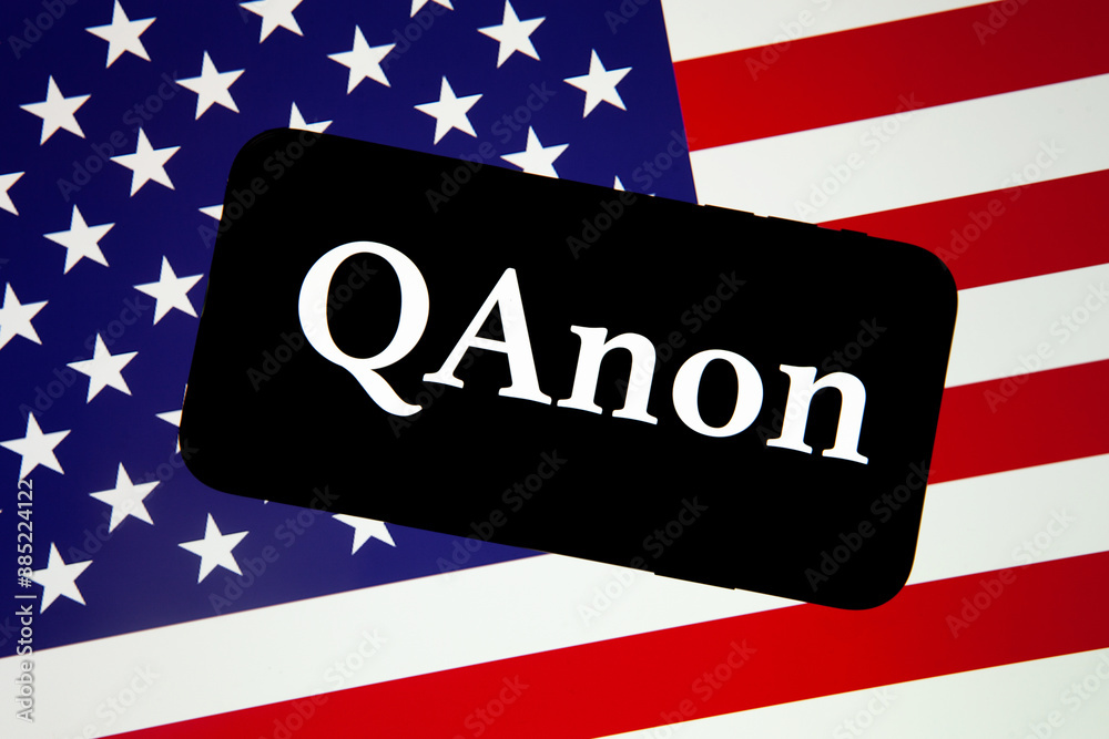 Stock-Foto „QAnon organisation logo seen on the smartphone which is ...