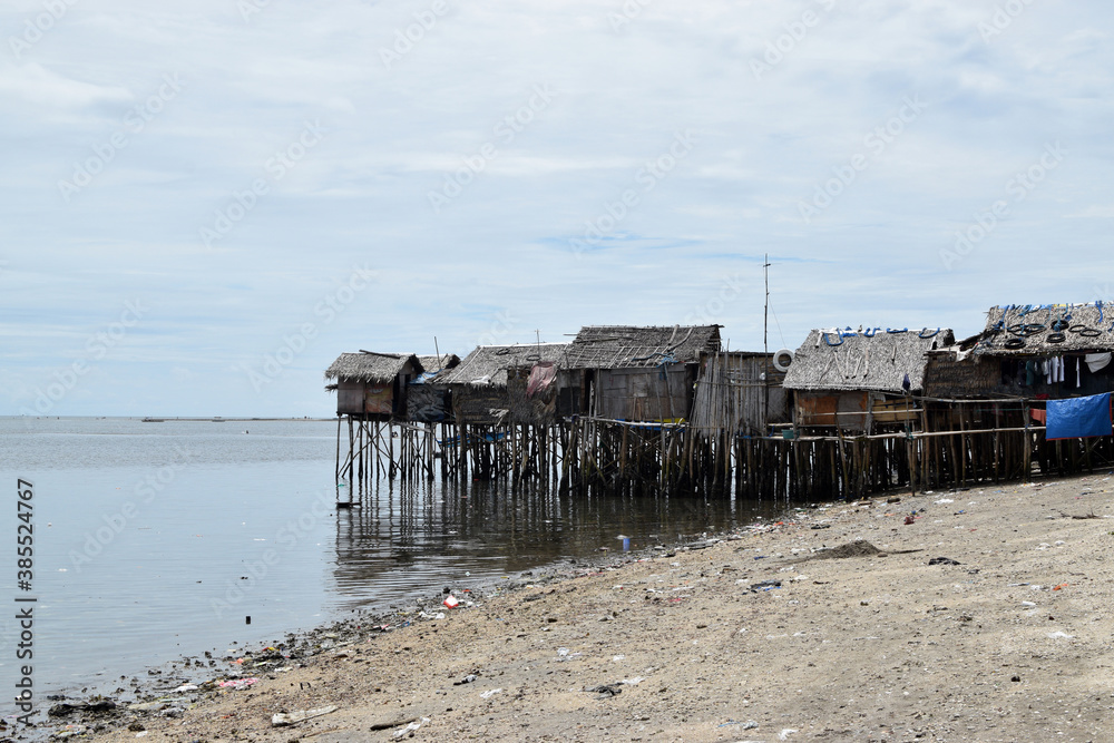 Over water stilt Bajau shanty houses built by indigenous people in the ...