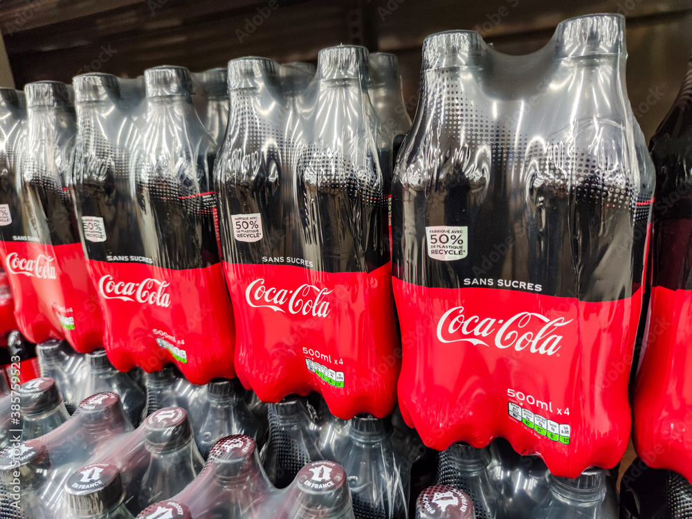 Coca Cola brand soft drink on display for sell at a supermarket shelf ...