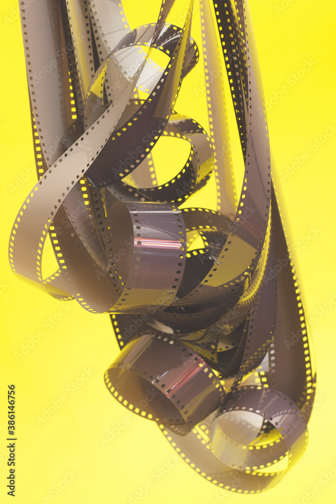 Negative photographic film on yellow background. 35mm negative film ...