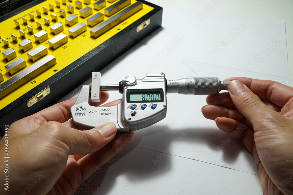 Stock-Foto „Digital micrometers and digital vernier calipers perform ...