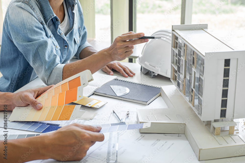 Architecture Engineer Teamwork Meeting, Drawing and working for ...