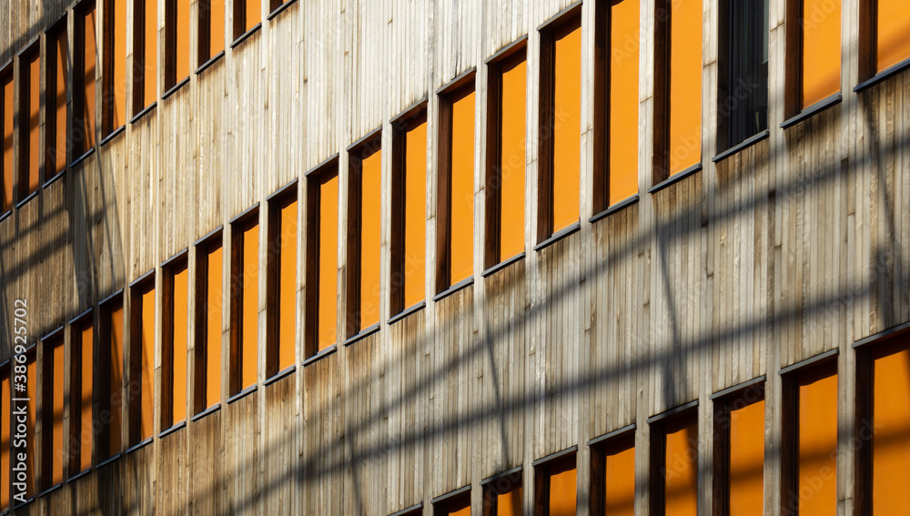 Exterior Wooden Cladding. Facade with Windows in a Row with Orange ...