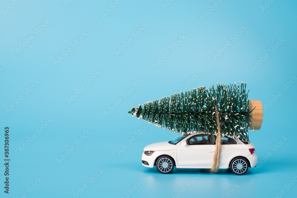 Merry Christamas concept. Side profile close up photo of mini toy white ...