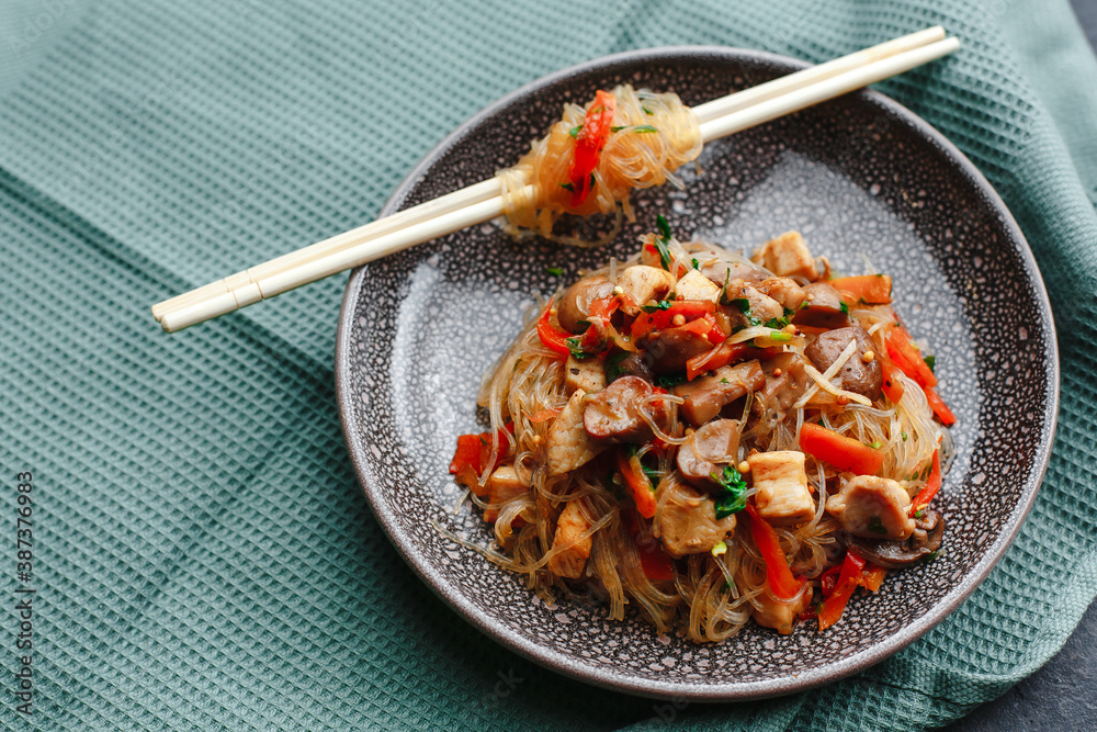 Cellophane rice noodles with chicken, mushrooms, bell peppers and herbs ...