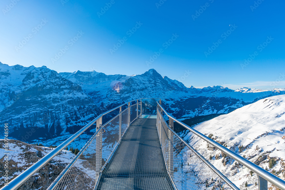 Metal bridge of the Cliff Walk on First mountain with spectacular view ...