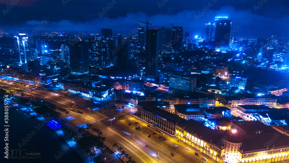 Road, lights and sea at night. Luanda city captured from the top Stock ...