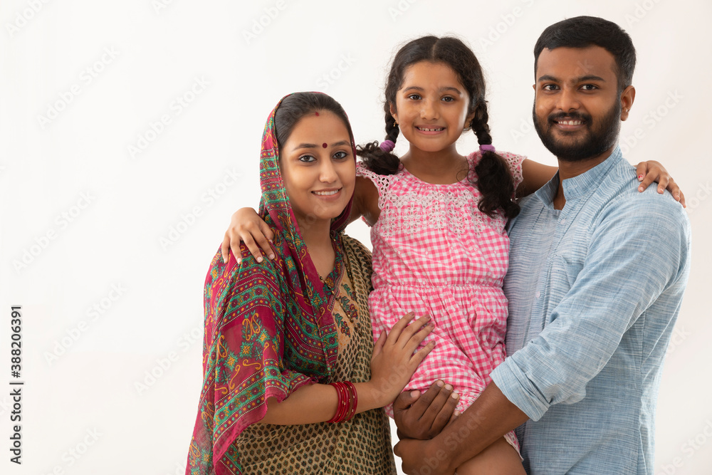 PORTRAIT OF A HAPPY RURAL FAMILY Stock Photo | Adobe Stock