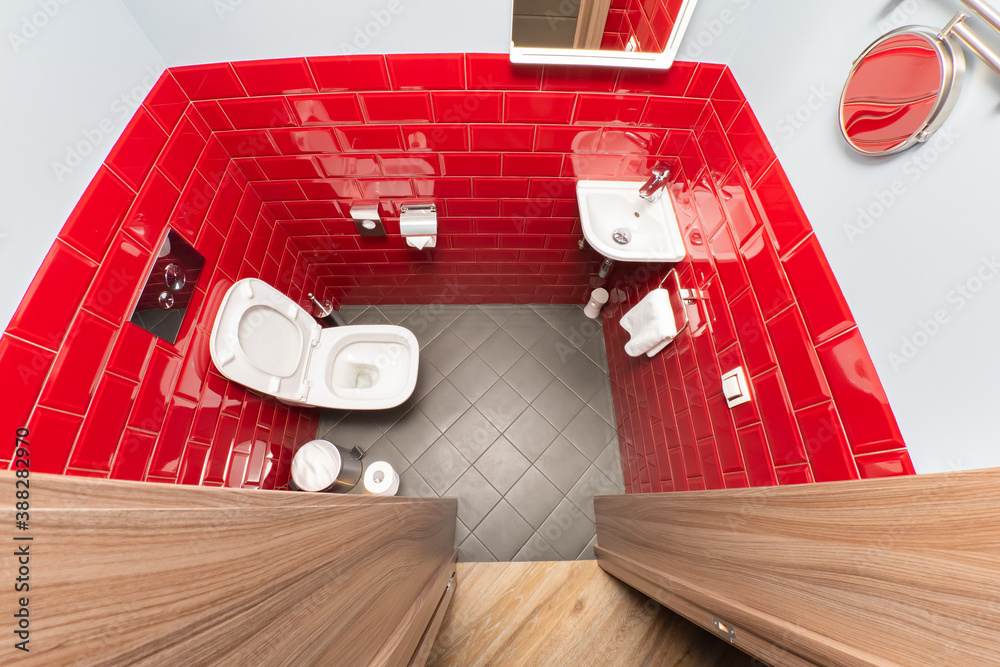 Стокове фото Restroom interior with red walls. Compact restroom top ...