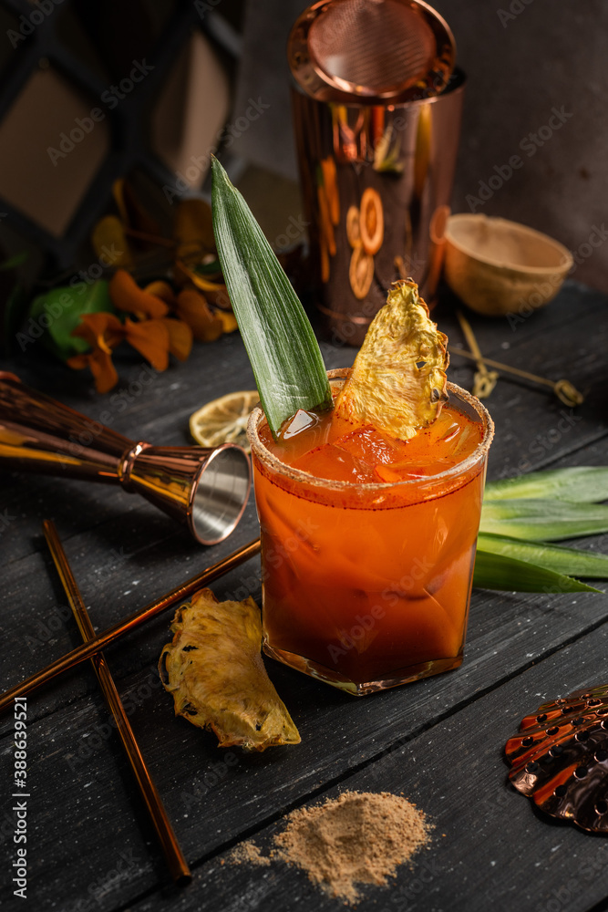 Coctel de mezcal con piña y chile Stock Photo | Adobe Stock