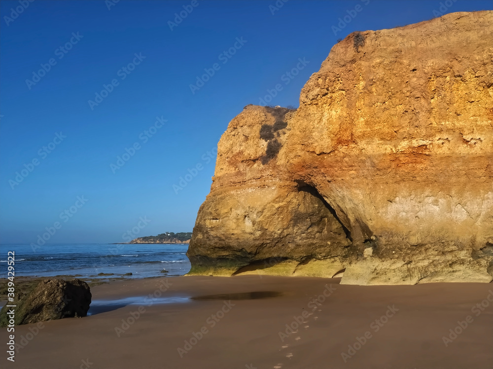 Hiking at the beach of Praia Maria Luisa, Olhos da Agua, Albufeira, at ...