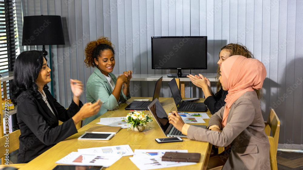 Business women from different ethnic races and cultures working ...