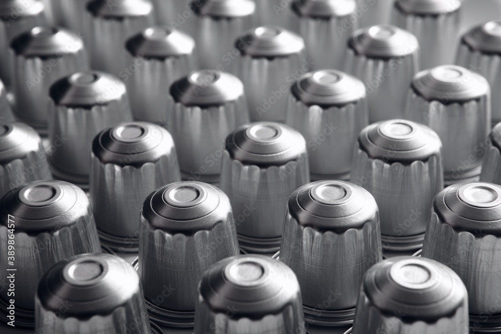 Front view of disposable coffee capsules. Coffee capsules waiting to ...