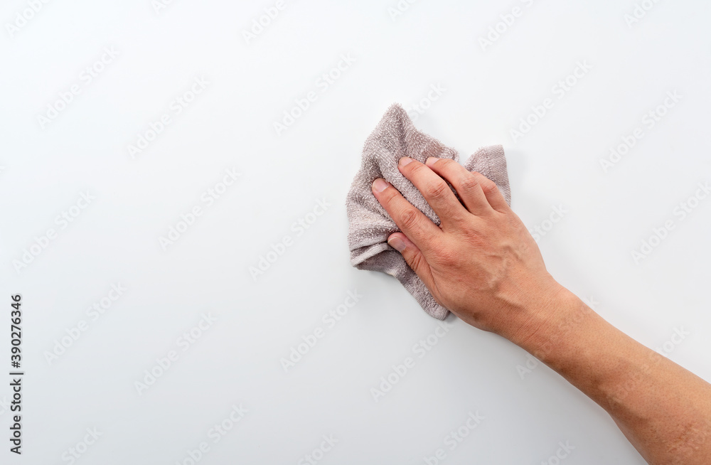 A man's hand on a white background with a rag Stock Photo | Adobe Stock