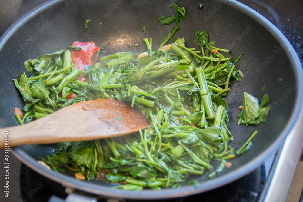 "Pad Pak Boong" a traditional Thai dish: stir fried "Morning Glory ...