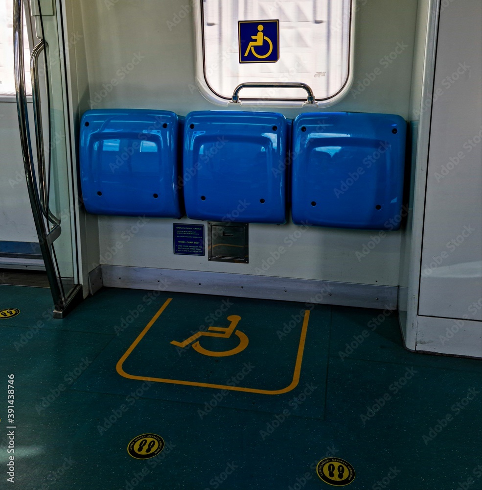 handicapped icon on the floor of subway car reserve for disabled people ...
