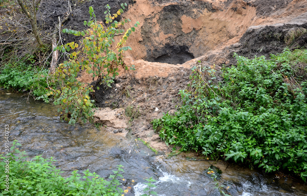 deep excavation flooded by water when the pipeline failed. mining of ...