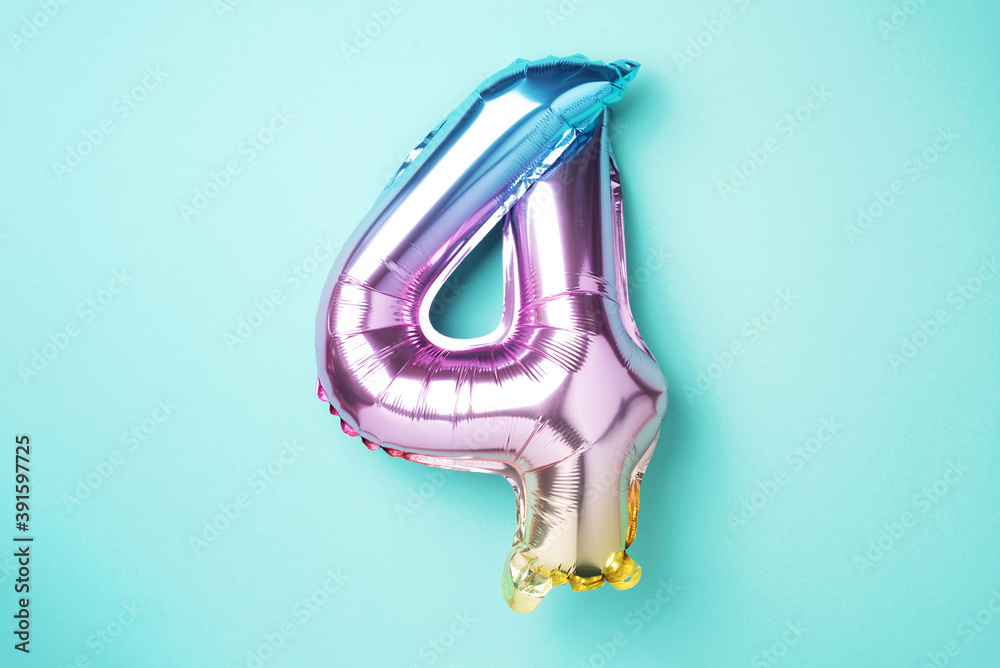 Creative layout. Rainbow foil balloon number and digit four 4. Birthday ...