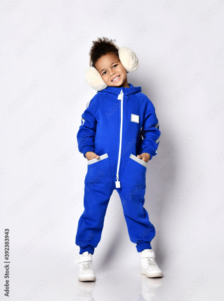 Portrait of nice smiling dark-skinned afr-russian kid girl in white ...