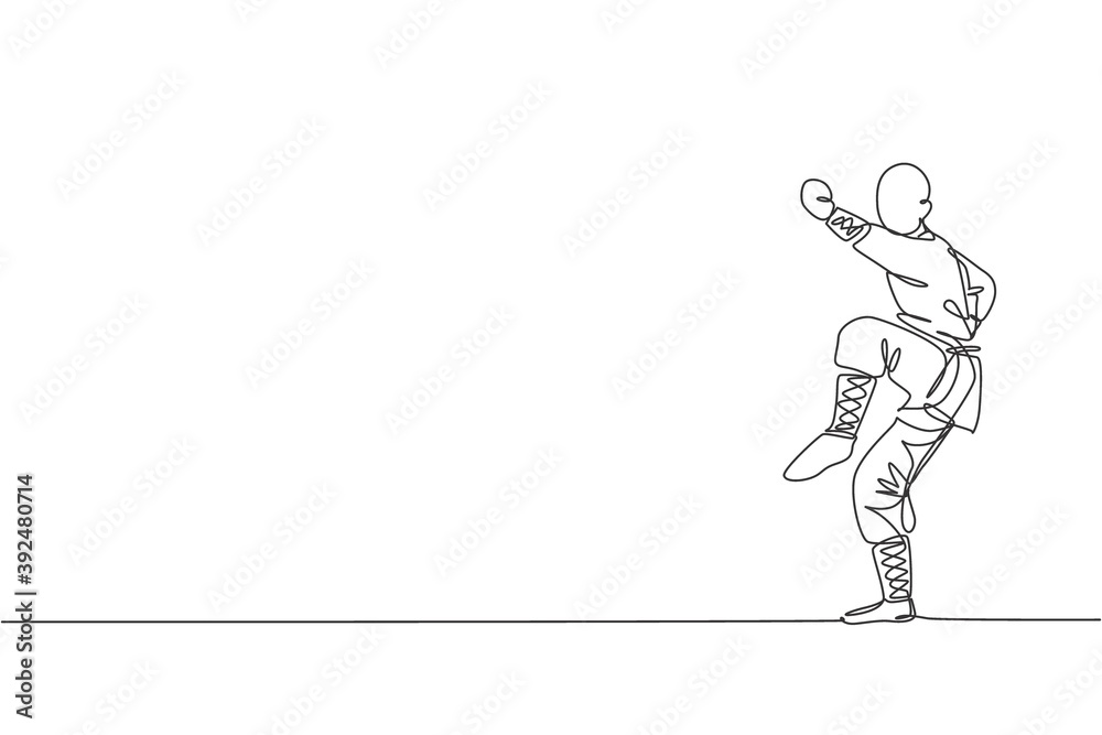 Single continuous line drawing young muscular shaolin monk man train ...