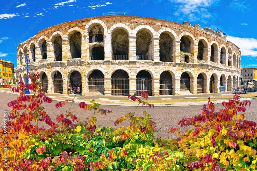Roman amphitheatre Arena di Verona and Piazza Bra square autumn leaves ...