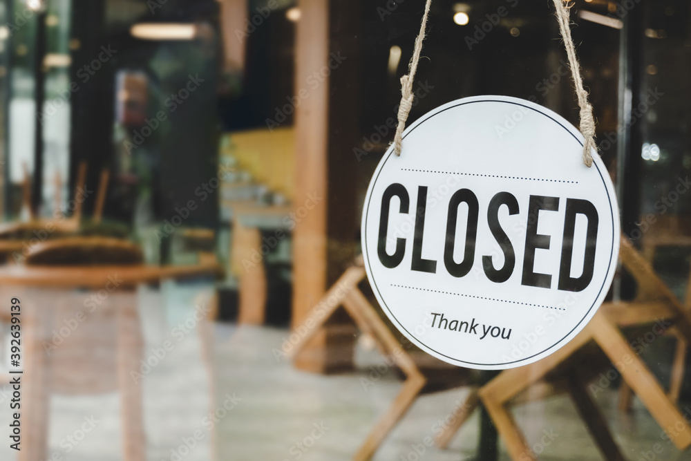 Closed. coffee cafe text on vintage sign board hanging on glass door in ...