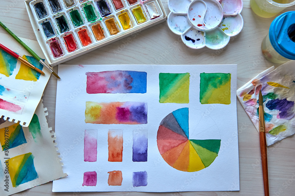 Artist's workplace. Art supplies brushes, paints, watercolors. Art ...