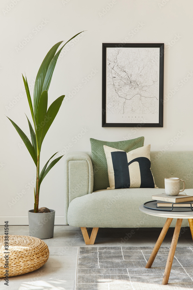 Unique loft interior with green comfortable sofa design furniture mock up poster map carpet plants decoration and elegant accessories. Modern home decor in living room. White wall. Template. Stock
