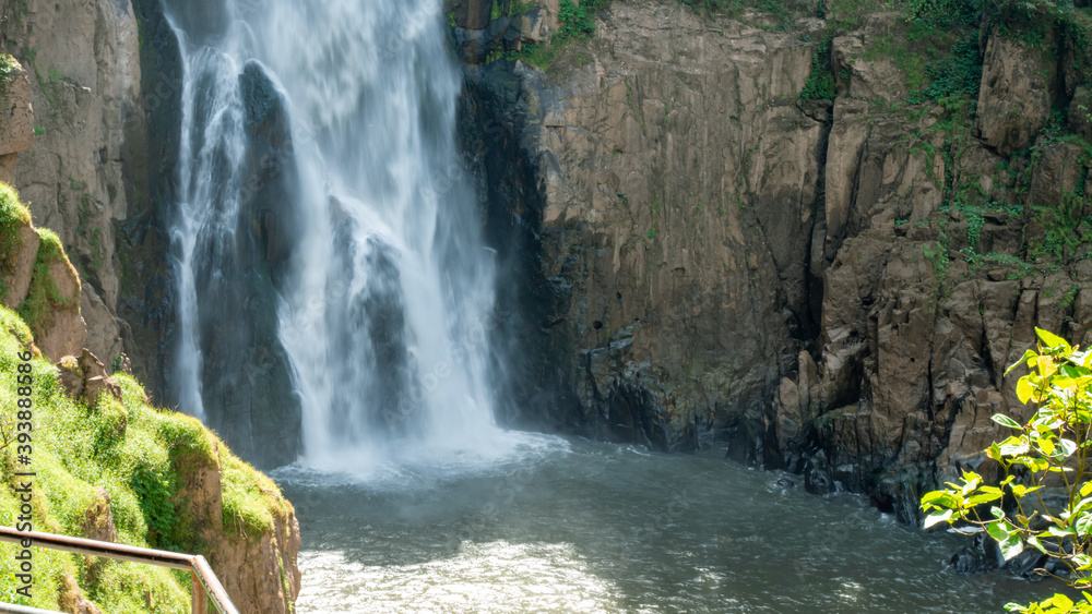 Stock-Foto „Picture of the waterfall from the middle of the forest At ...