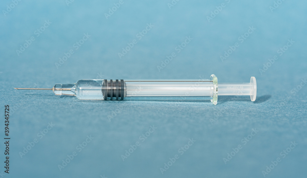 Vaccine - injection of a vaccine with a syringe - solution against the ...