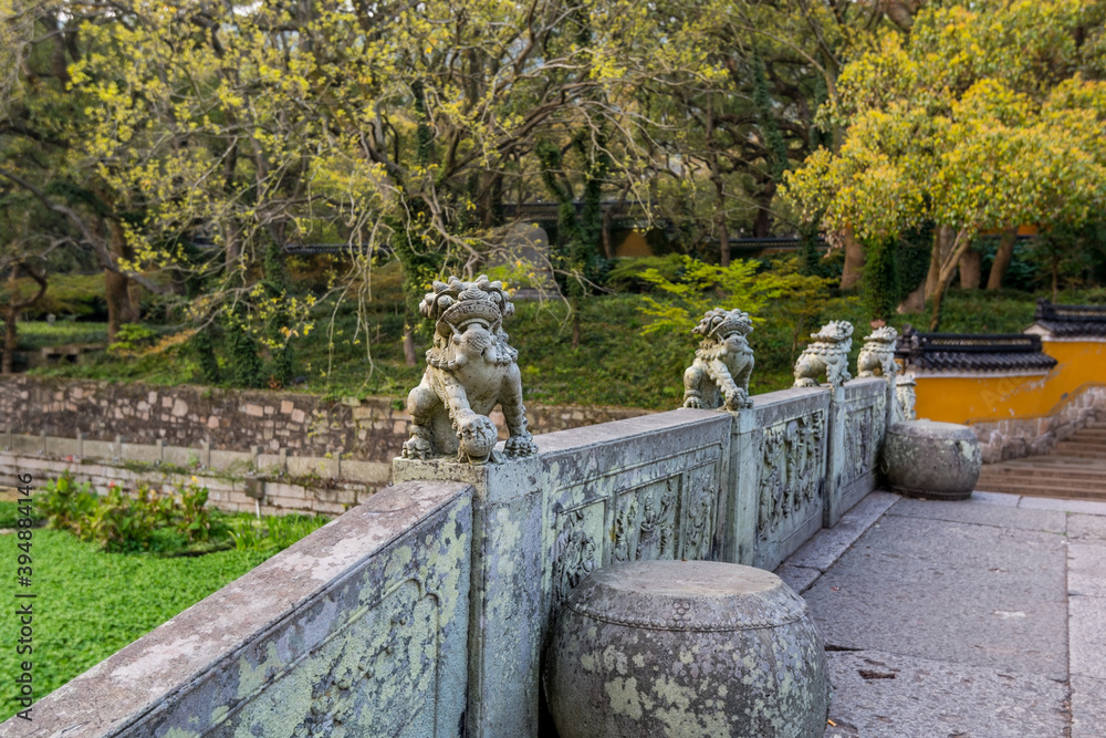 Animal statue on the handrail of the bridge to Fayu temple in the ...