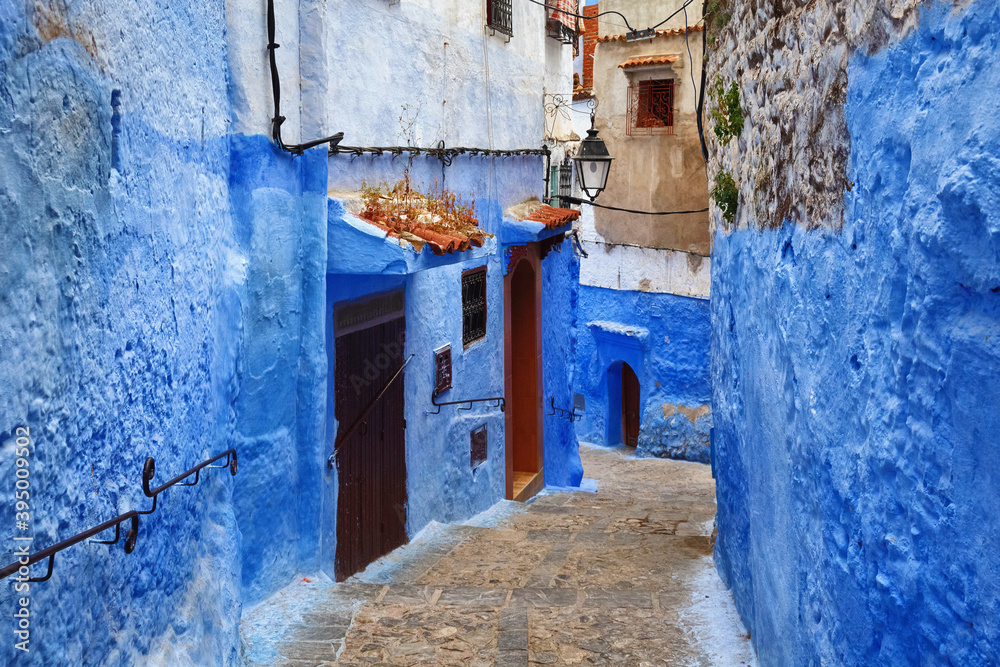 View of the blue walls of Medina quarter in Chefchaouen, Morocco. The ...