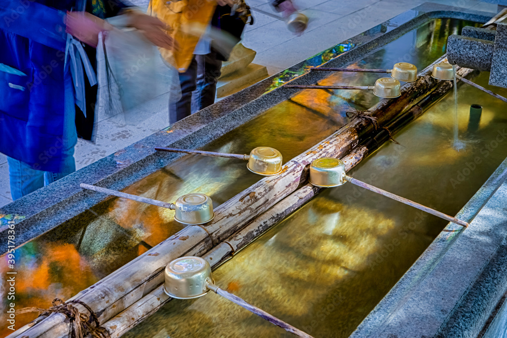 Men Washing Hands in Traditional Shinto Wash Basin At Danjo Garan ...