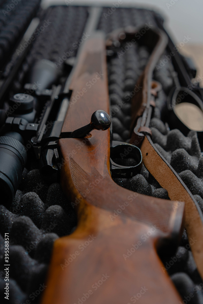 Foto Top view of beautiful rifle with wood stock. Caliber 22 long rifle ...