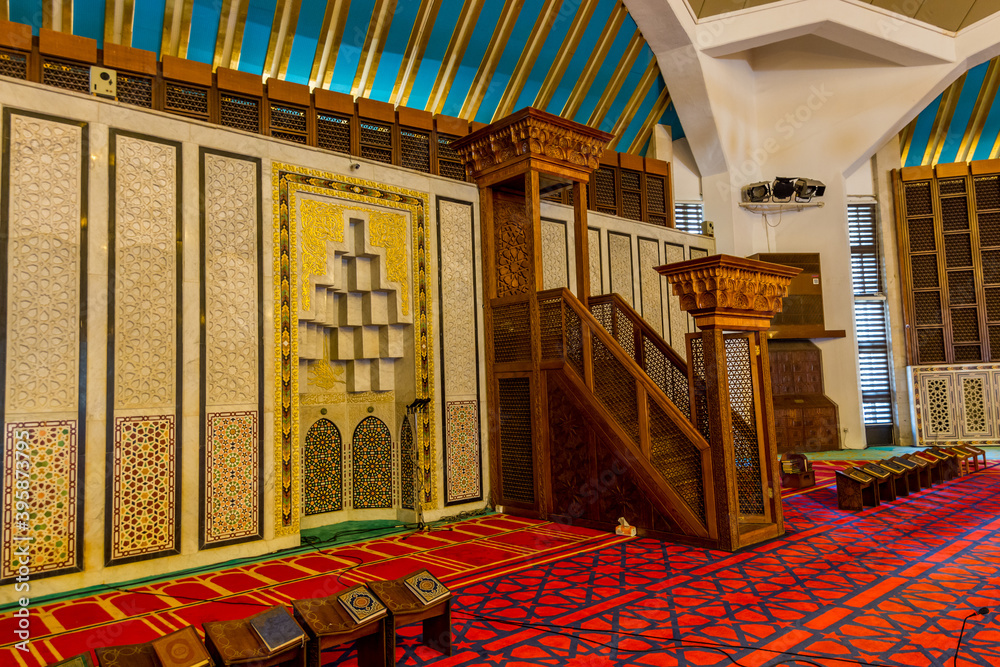 Interiors with red Arabic traditional carpet in King Abdullah I Mosque ...