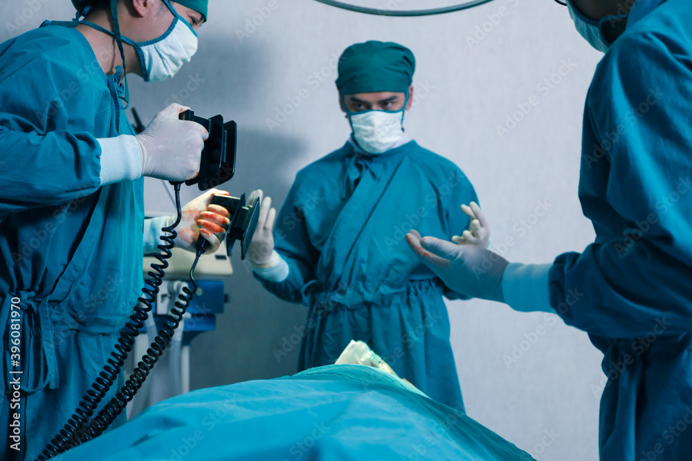 Surgical team or doctor and staff have vivisection in surgery room of ...