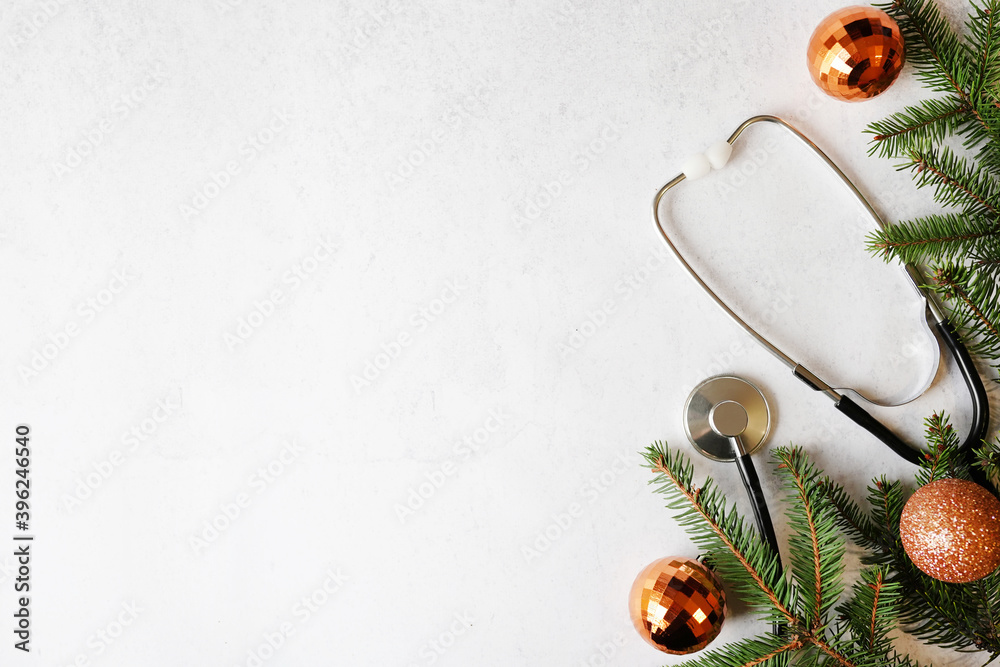 Christmas medicine background with stethoscope and golden new year ...