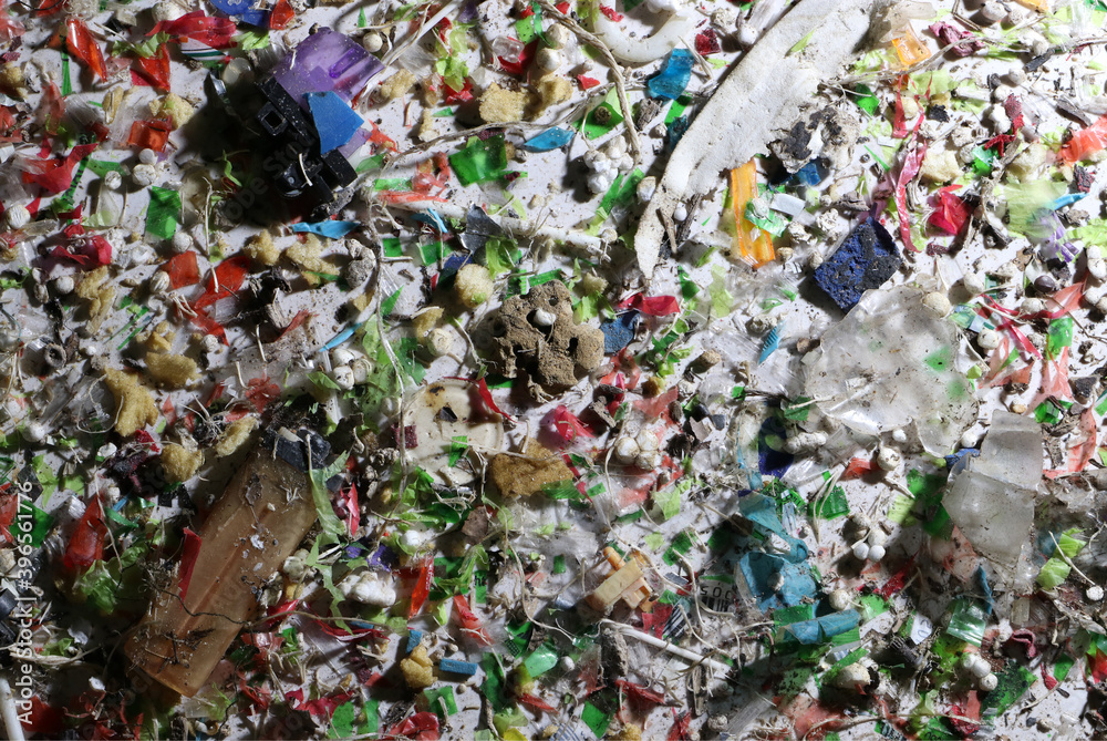 Dangerous Marine litter microplastics on beach Stock Photo | Adobe Stock