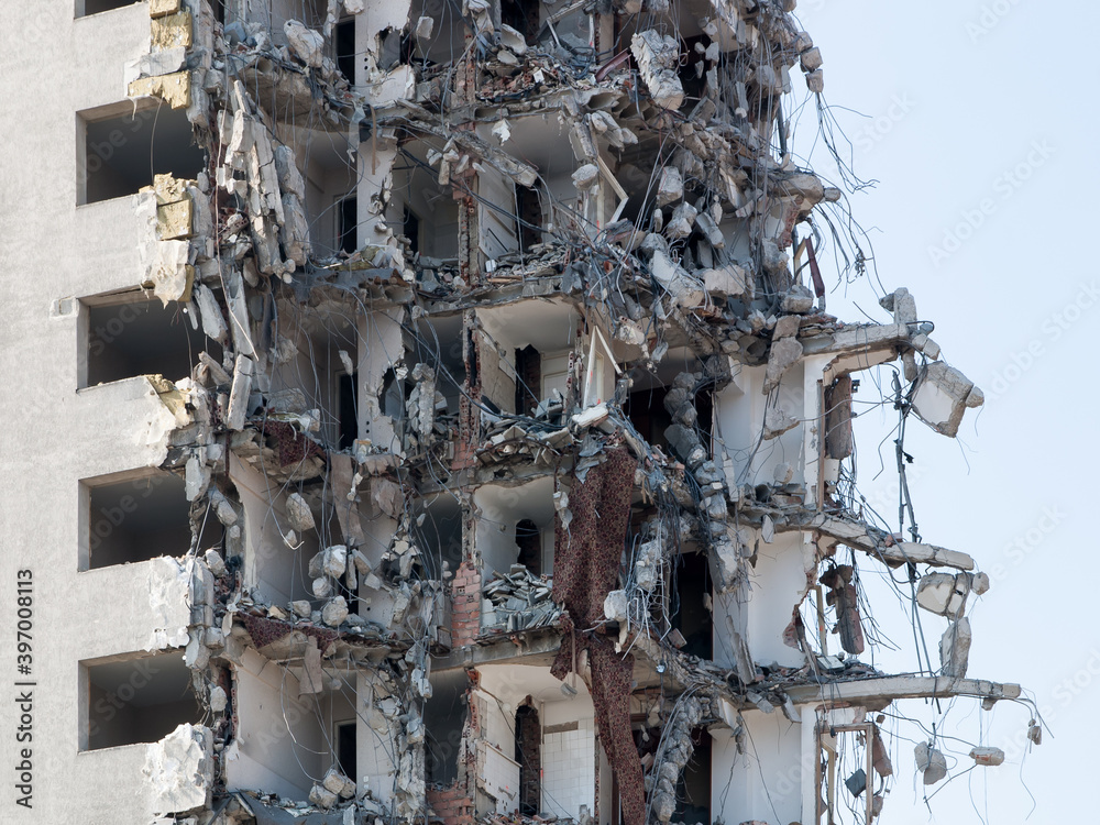 complete demolition destruction of a tall building completely ruined ...