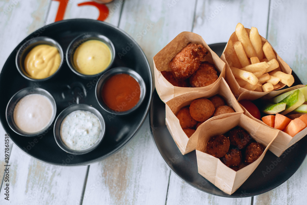 Fast food lunch in several packages different types of fast food and ...