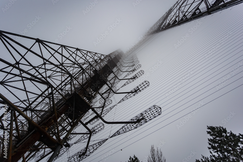 Soviet radar Duga in foggy weather. Russian woodpecker - over-the ...
