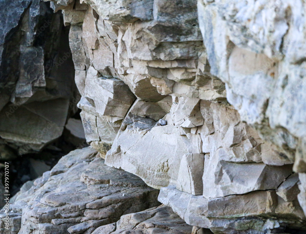 mountain textures of stones with interlayers of gypsum, colored quartz ...