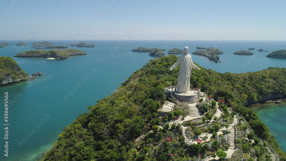 Statue of Jesus Christ on Pilgrimage island in Hundred Islands National ...