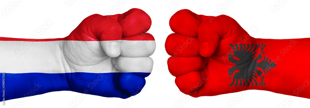 Two hands are clenched into fists and are located opposite each other ...